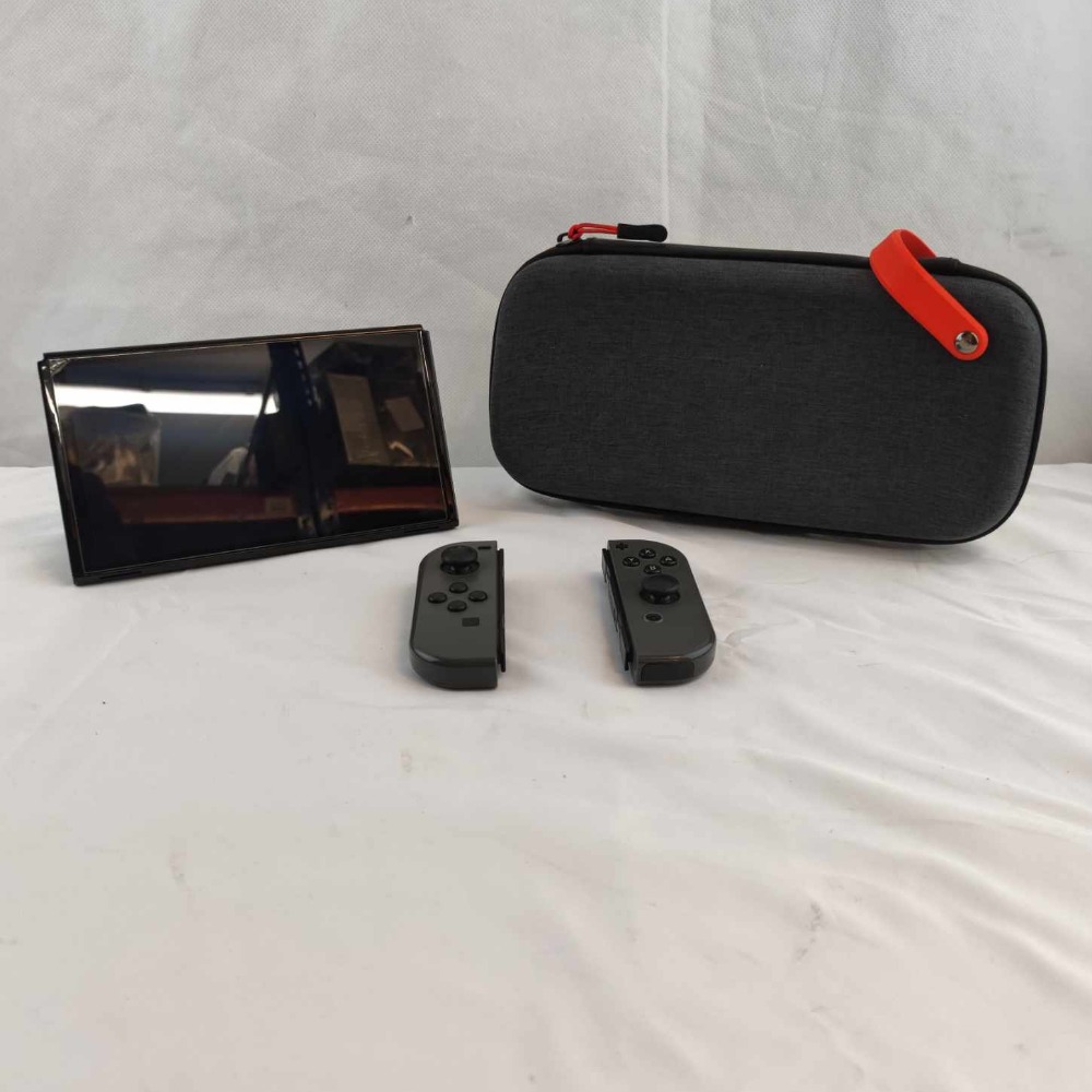 Nintendo Switch OLED with Grey JoyCons - Own4Less